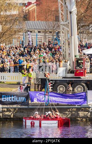 Dipping the fresh polytechnic students in Tammerkoski rapid as a ...