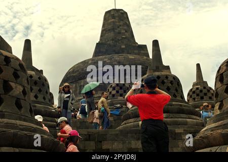Visitors having recreational time at Borobudur temple in Magelang ...