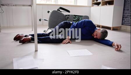 Faint Accident In Office. Fall From Chair Stock Photo - Alamy