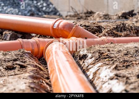plastic pipe for sewage network in the base plate at the construction ...