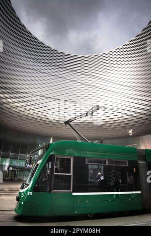 Tram passing through Basel exhibition centre, the new Messe Basel trade ...