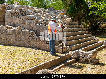 Surveyor at work, Temple of Panels, Templo de los Tableros Esculpidos ...