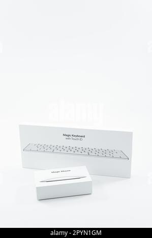image with Apple Magic mouse and Magic keyboard boxes on a white table ...