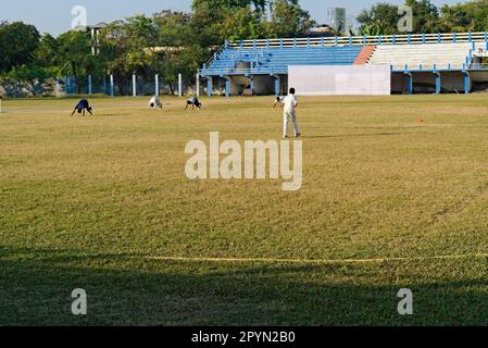 small kids playing cricket in stadium playground in india Stock Photo ...