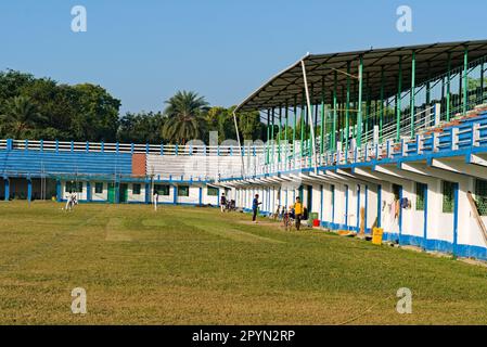 small kids playing cricket in stadium playground in india Stock Photo ...