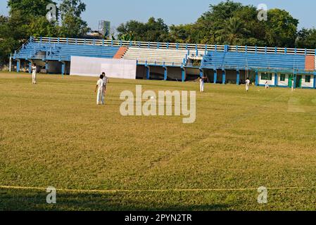 small kids playing cricket in stadium playground in india Stock Photo ...