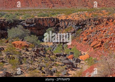 Lava Boulders in a Sandstone Arroyo in Snow Canyon State Park in Utah ...