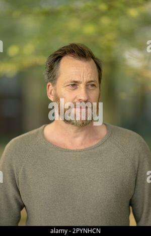 Norden, Germany. 03rd May, 2023. Christian Erdmann, actor, stands on ...