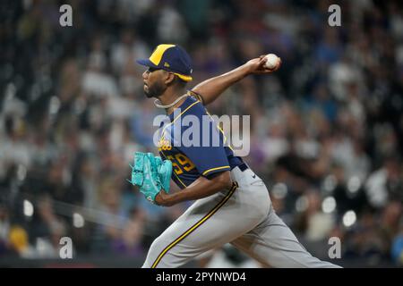 Milwaukee Brewers relief pitcher Elvis Peguero throws against the ...