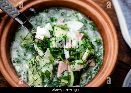 Okroshka, Russian cold soup on a wooden background Stock Photo - Alamy