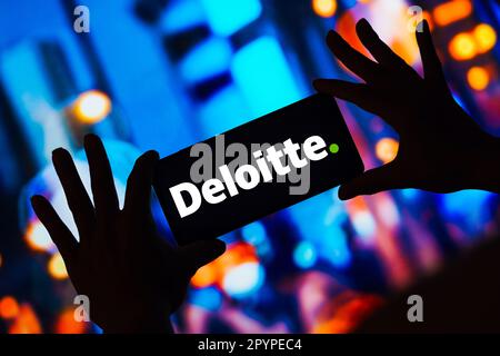In this photo illustration a Deloitte Touche Tohmatsu Limited logo seen ...