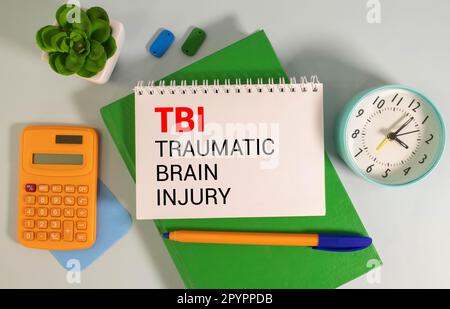 TBI traumatic brain injury symbol. Concept words TBI traumatic brain ...