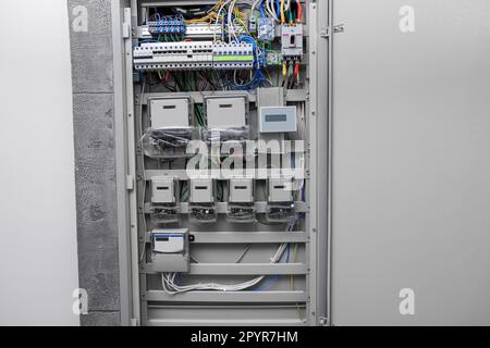 Fuse box with many electric meters and wires Stock Photo - Alamy