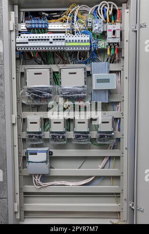 Fuse box with many electric meters and wires Stock Photo - Alamy