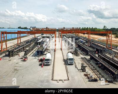 Kota Bharu, Malaysia. 26th Apr, 2023. Employees work at a construction ...