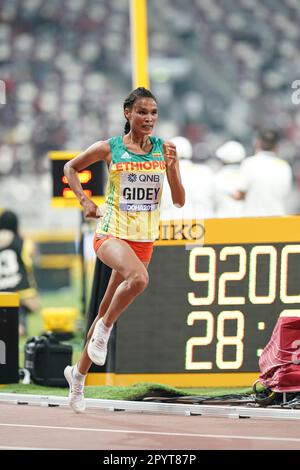 Letesenbet Gidey running the 10.000 m at the 2019 World Athletics ...