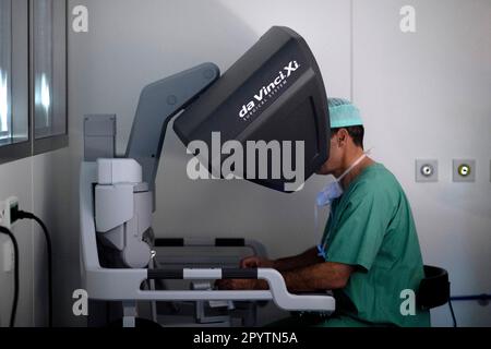 Doctor assists during a modern hybrid surgery, 3D innovative technology ...