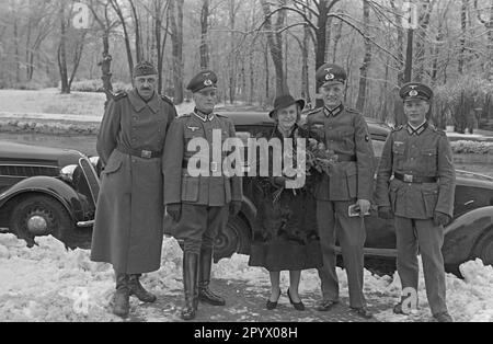 A German soldier with his wife. The soldier wears a dress uniform of an ...