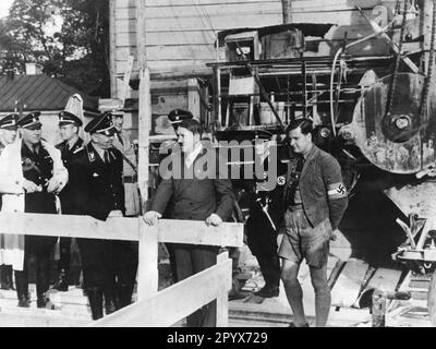 Adolf Hitler inspects the construction site of the olympic buildings ...