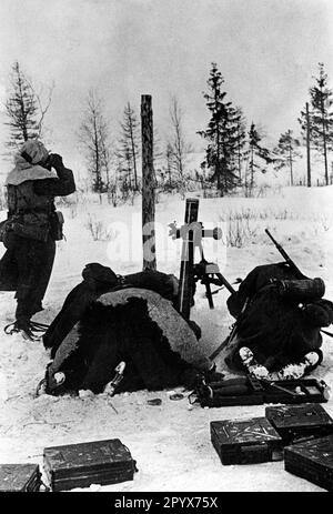 German soldiers firing a grenade launcher at targets on the Eastern ...