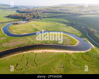 aerial views of the meanders of the cuckmere river in the south downs ...