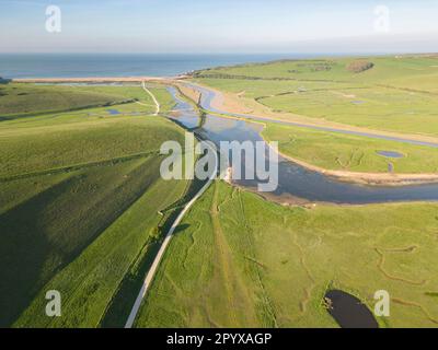 aerial views of the meanders of the cuckmere river in the south downs ...