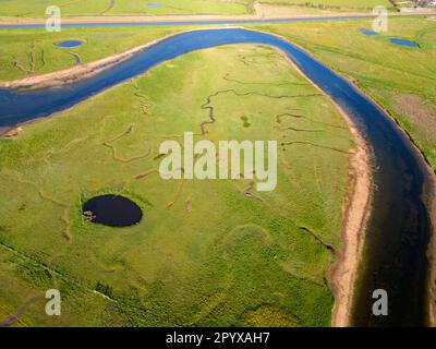 aerial views of the meanders of the cuckmere river in the south downs ...
