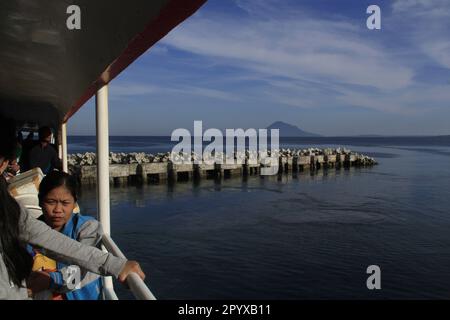 Part of a passenger ship approaching the port of Manado in Indonesia ...