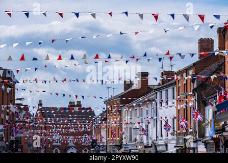 Bunting and flags adorn the High Street in Ashbourne as preparations ...