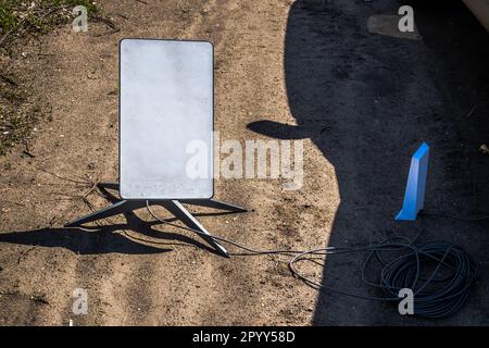 Ukrainian soldier using Starlink, a satellite internet constellation ...