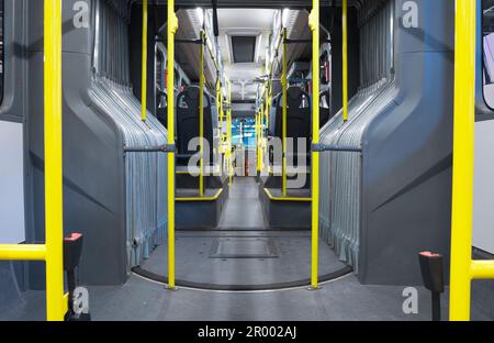 Interior of an articulated bus. Low floor vehicle. On display at the ...