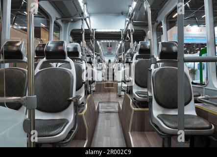 Interior of an articulated bus. Low floor vehicle. On display at the ...