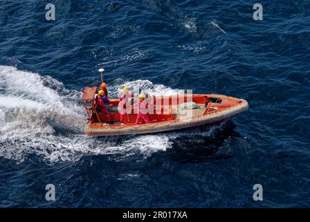 The Maritime Crew of a Seismic Research Vessel making fast the Tow rope ...