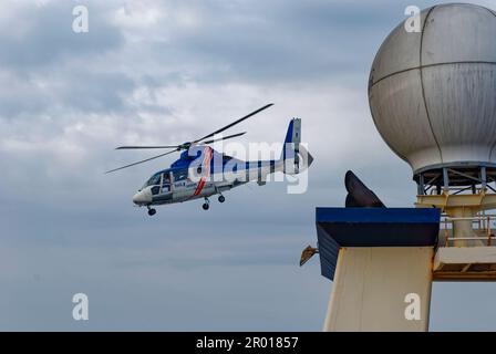 The Maritime Crew of a Seismic Research Vessel making fast the Tow rope ...