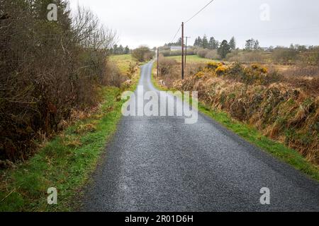 resurfaced rough tarmac road in rural county donegal republic of ...