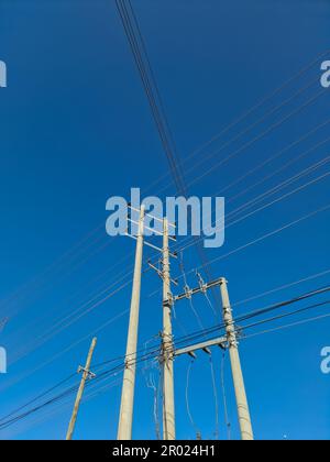 Wildly attached power cables to a power pole Stock Photo - Alamy