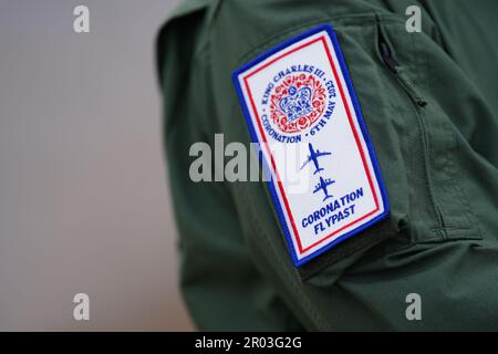 A commemorative patch on the uniform of Squadron leader Mike Willers ...