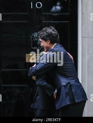 Prime Minister Rishi Sunak hugs his father Yashvir Sunak, as his mother ...