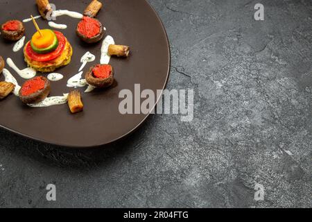 front view cooked squashes designed meal inside plate on a grey ...