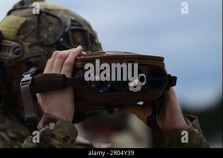 A member of the Belgian Army Special Operations Regiment uses a radio ...