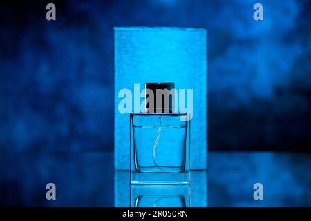 front view expensive perfume on light-blue background valentines day ...