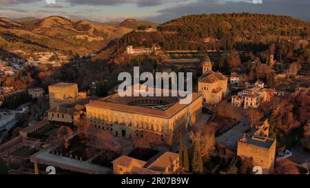 Aerial view of the famous Alhambra palace and fortress at sunset, in ...