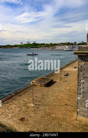 The Cremyll Ferry makes its way past Royal William Yard, a former Royal ...