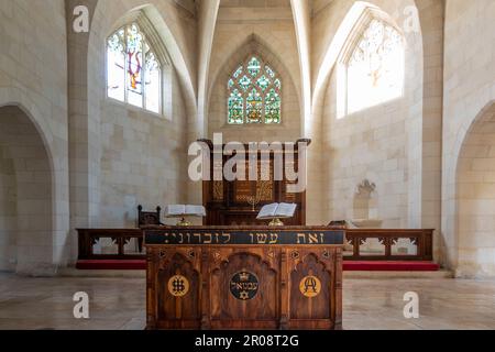 The wooden alter with Jewish symbols and verses in Hebrew inside the ...