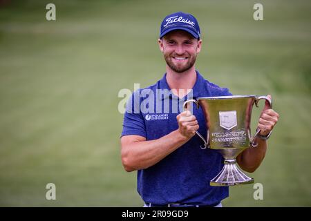 Wyndham Clark holds the trophy after winning the U.S. Open golf ...