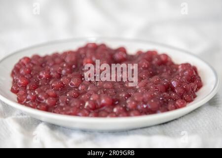 Red wine sago with vanilla cream, traditional cultural dessert from ...