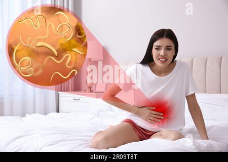 Parasites under microscope and woman suffering from helminthiasis Stock ...