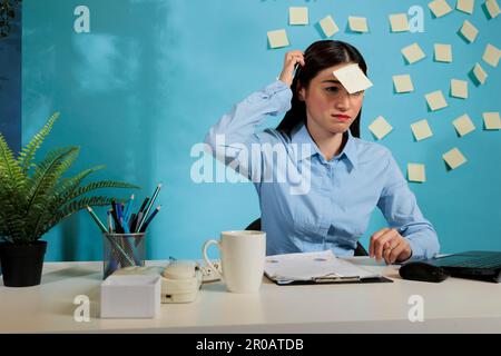 office worker woman was hesitant about the uncertain situation Stock ...