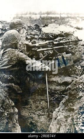 German Soldiers of the 6th SS Mountain Division Nord dressed in ...