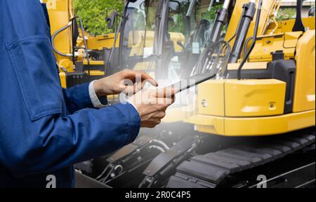 Fleet of yellow construction machines. High quality photo Stock Photo ...